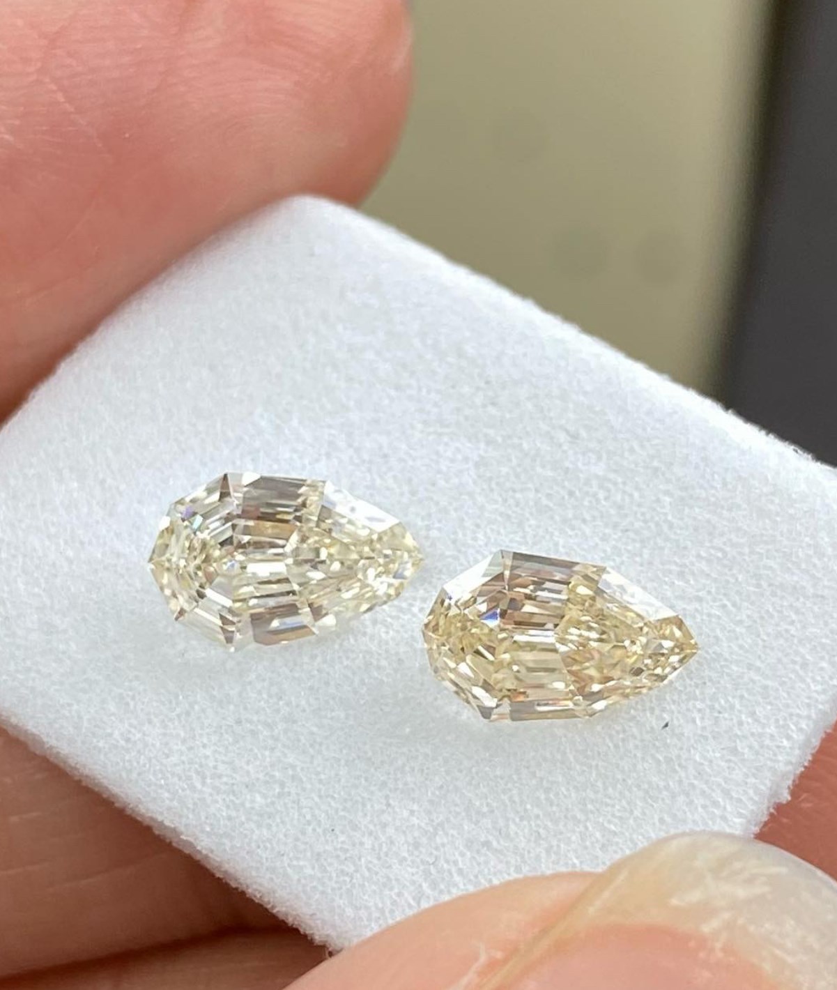 A rare and stunning combination of two step cut pear-shaped diamonds ...